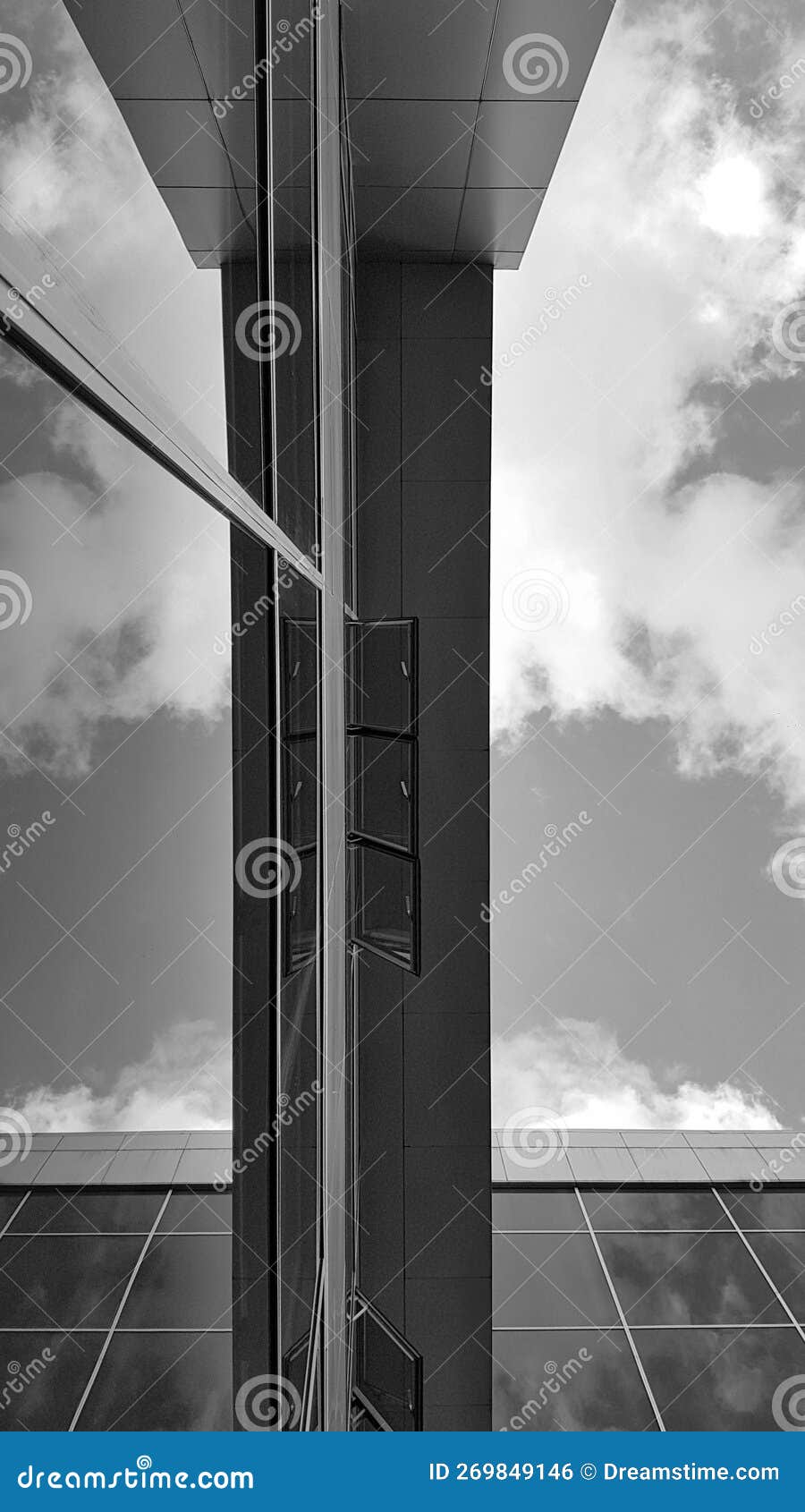 Modern Building with Open Windows and Reflecting Clouds - Black and ...