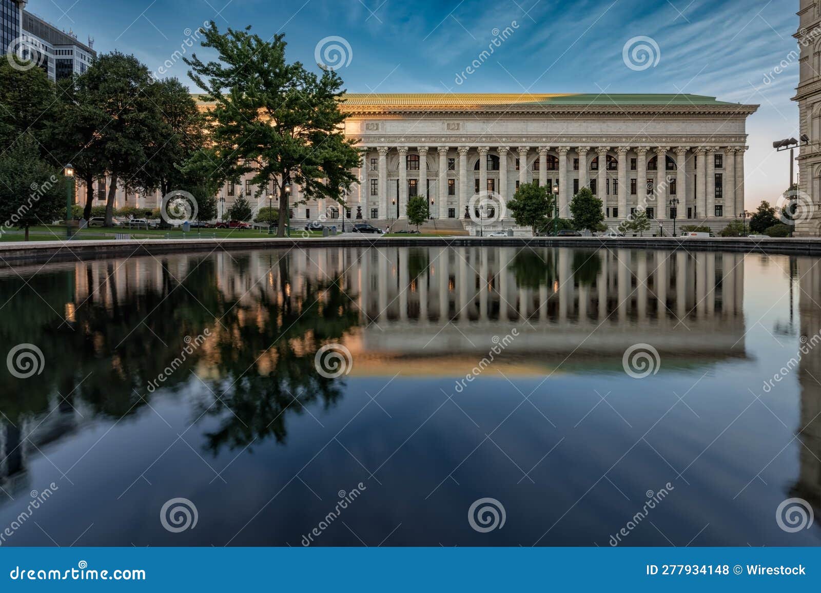 Modern Building Reflected in the Still Waters of a Pond at the NY State ...
