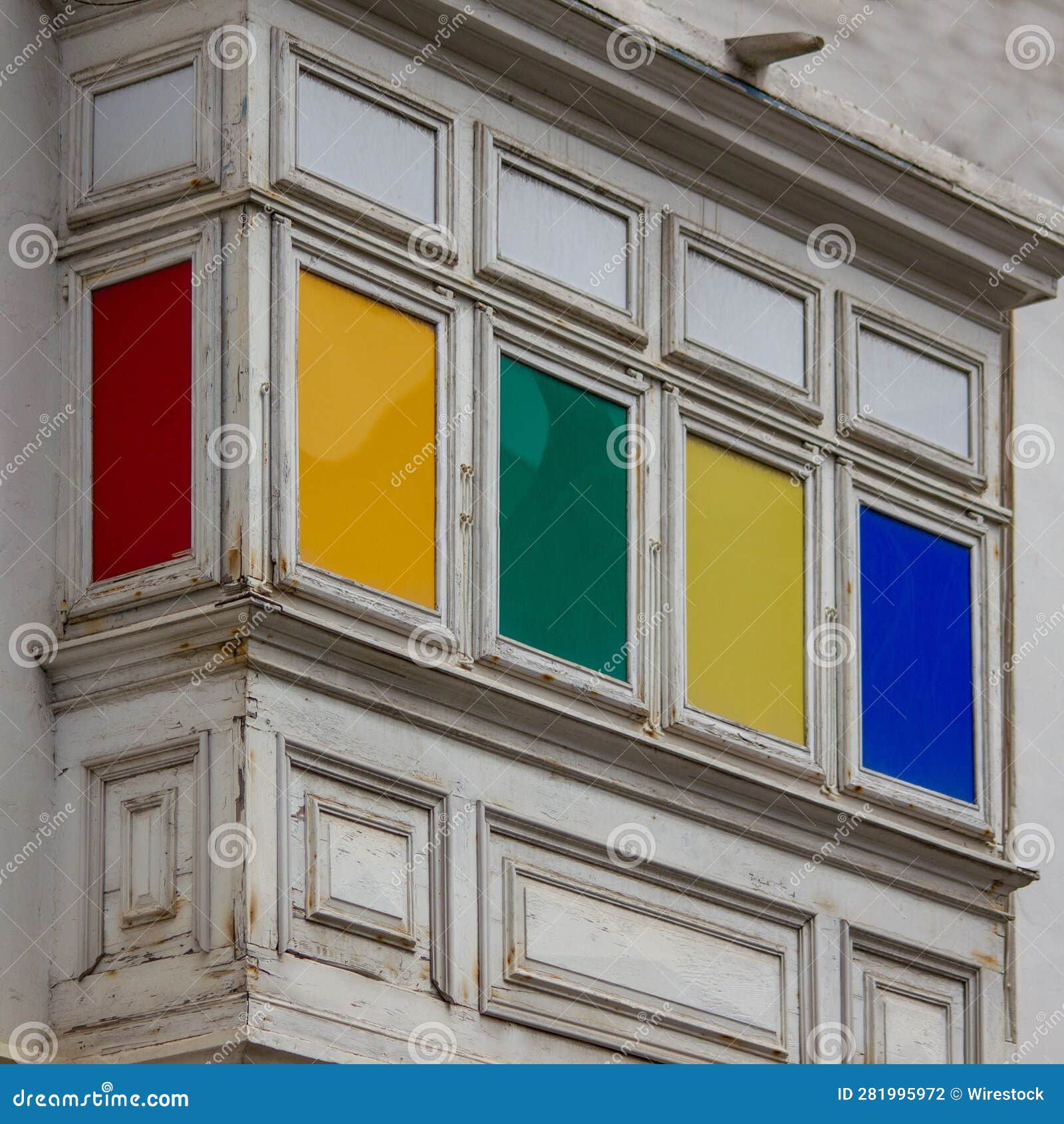 Modern Building with a Unique Multi-colored Window Pattern Stock Photo ...
