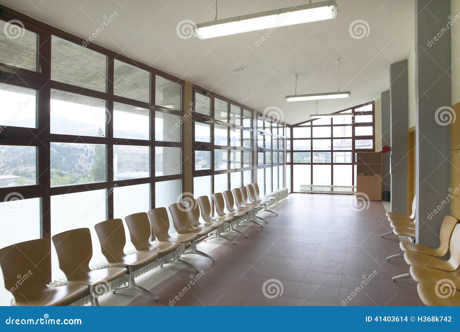Modern Building Waiting Area with Wooden Seats Stock Photo - Image of ...