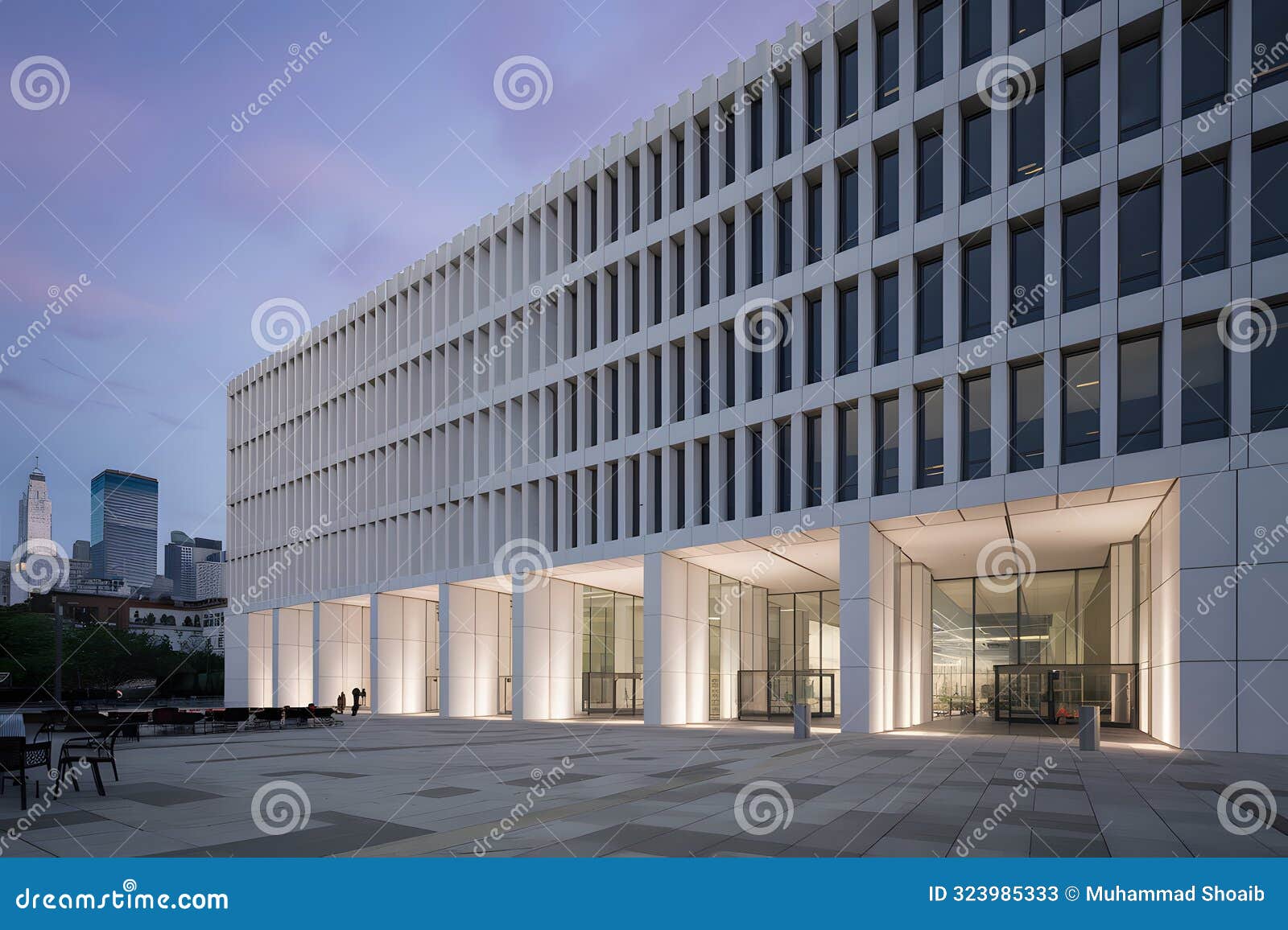 Modern Building with White Facade and Grid Pattern Overlooks City ...