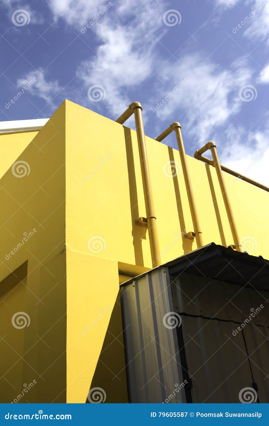 Modern Building Yellow Color and Pipe with Sky. Stock Image - Image of ...