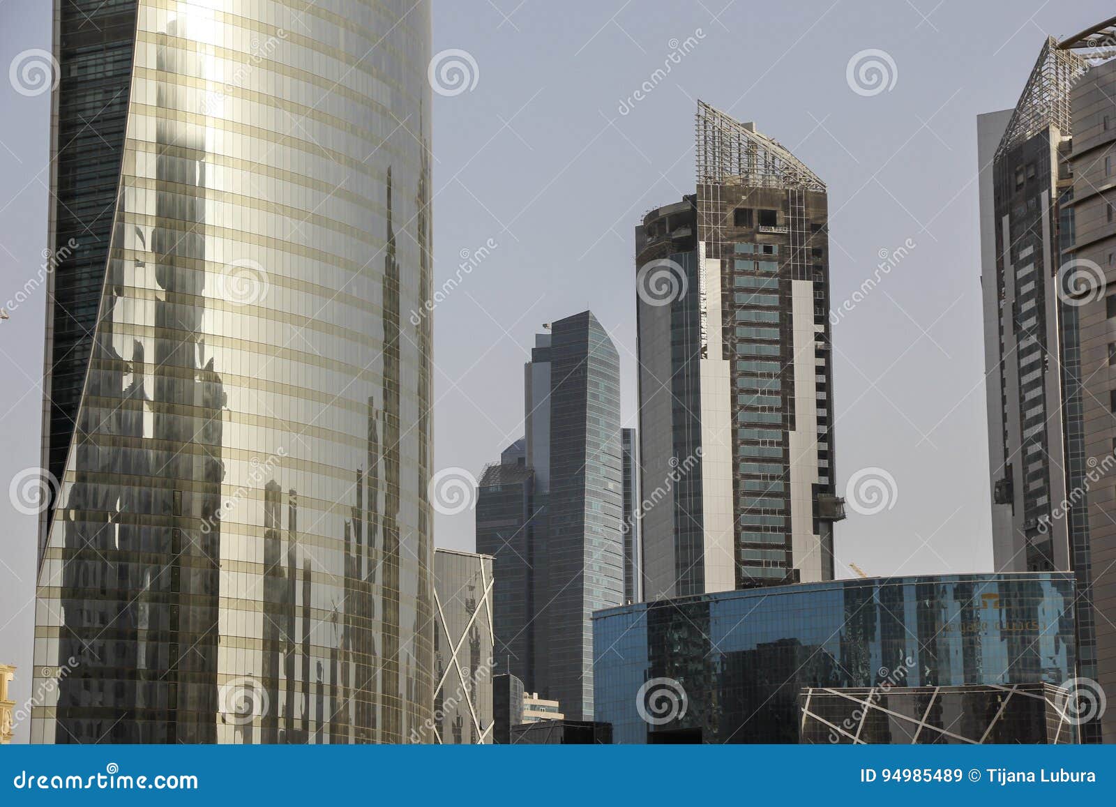 Modern buildings in Doha editorial stock image. Image of museum - 94985489