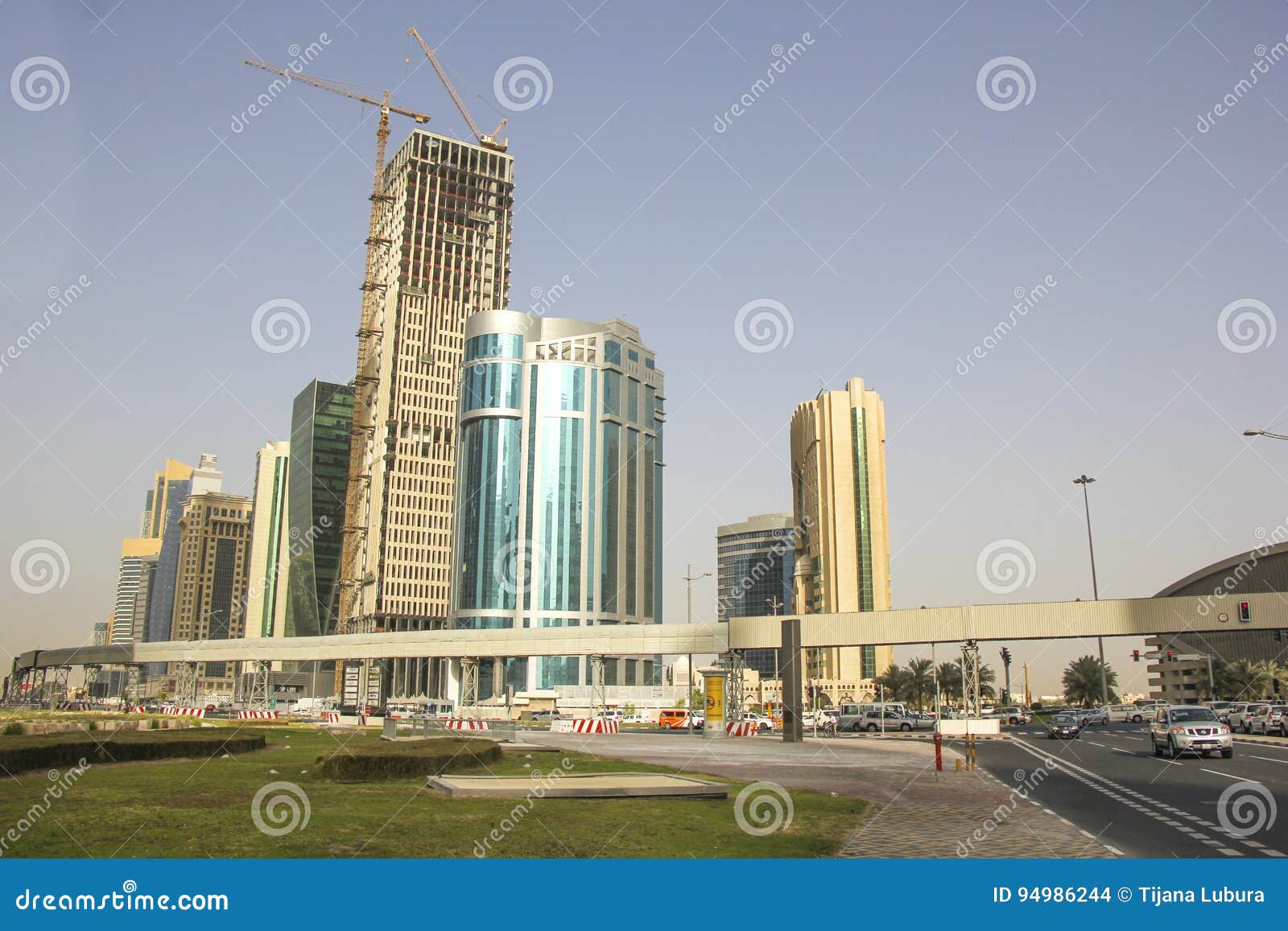 Modern buildings in Doha editorial stock image. Image of museum - 94986244
