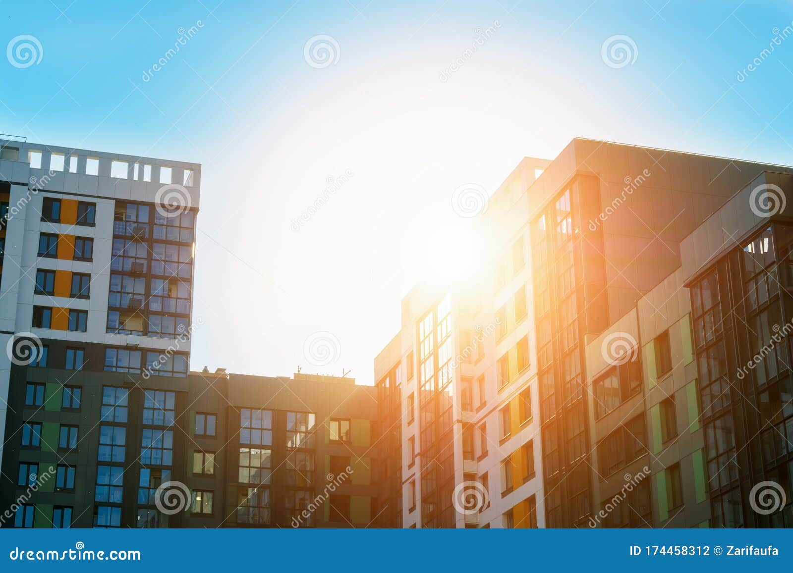 Modern Buildings on Sunlight and Blue Sky Background Stock Photo ...