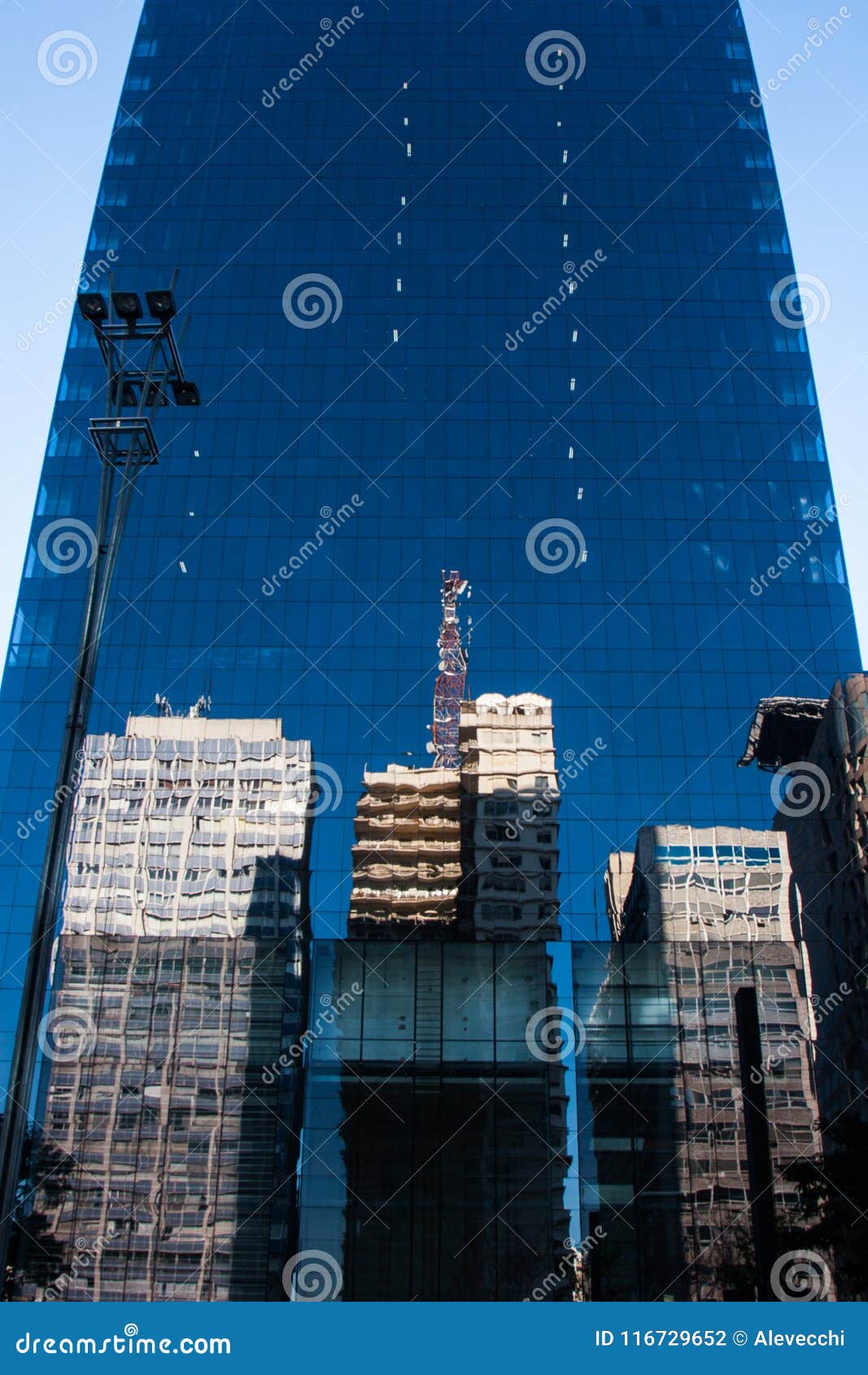 Modern Business Tower with a Tall Light Pole in Front Stock Photo ...