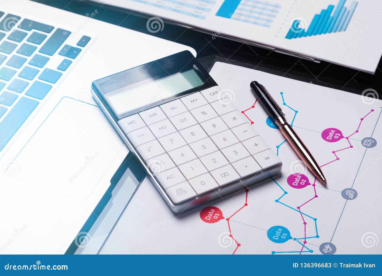 Modern Calculator is on a Laptop and on a Sheet with a Graph Stock ...