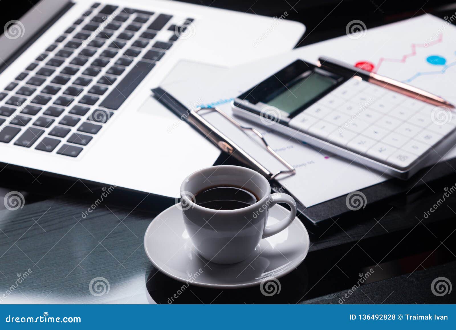 Modern Calculator Is On The Notebook And On The Sheet With The Schedule ...