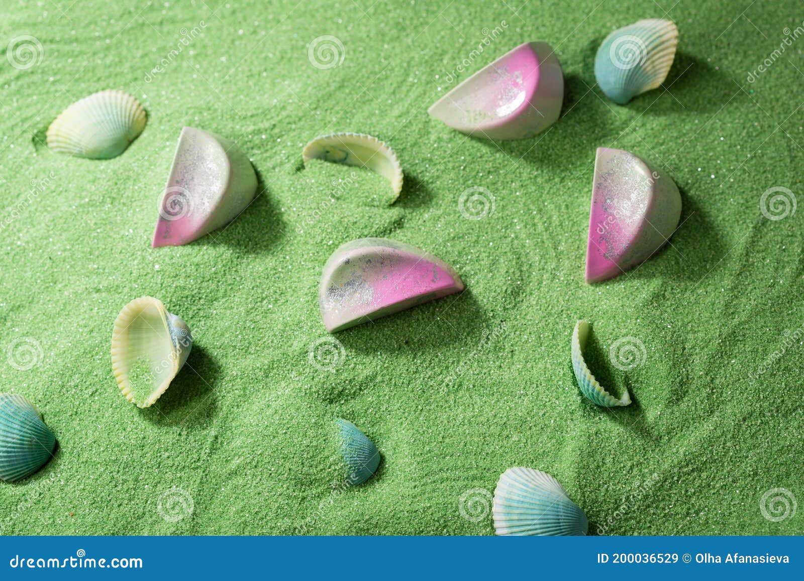 Modern Candies on Green Sand and Seashell Stock Image - Image of candy ...