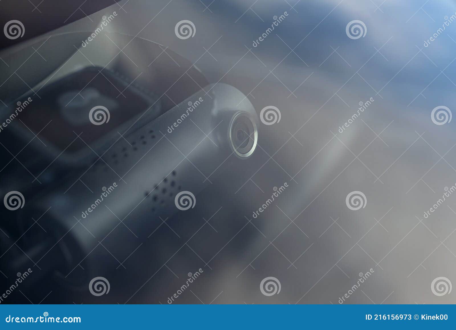 A Modern Car Camera is Attached To the Inside of the Windshield, Under ...