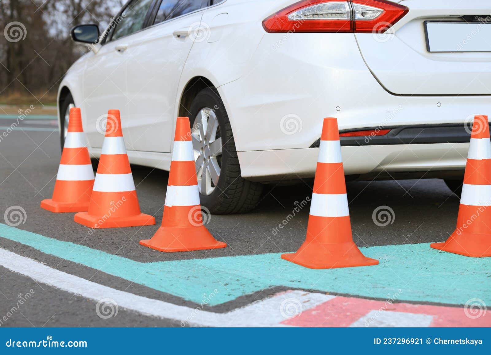 Modern Car on Driving School Test Track with Traffic Cones Stock Image ...