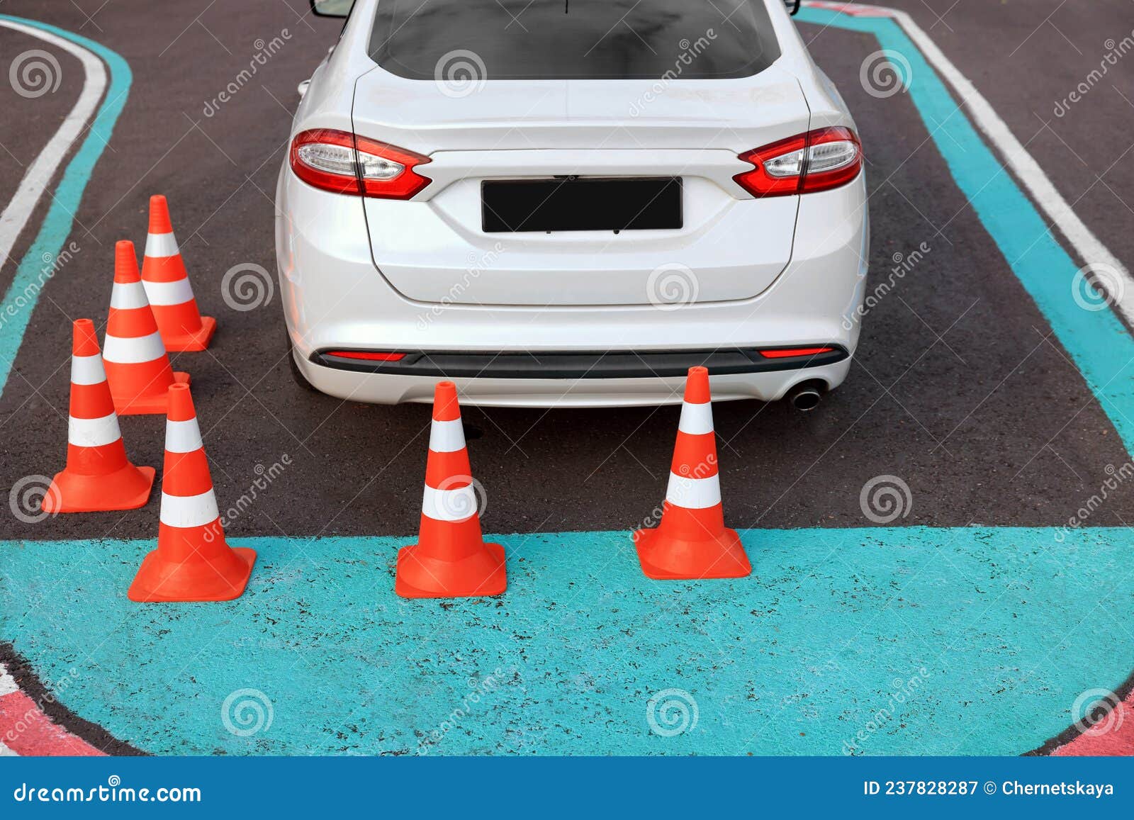 Modern Car on Driving School Test Track with Traffic Cones, Above View ...