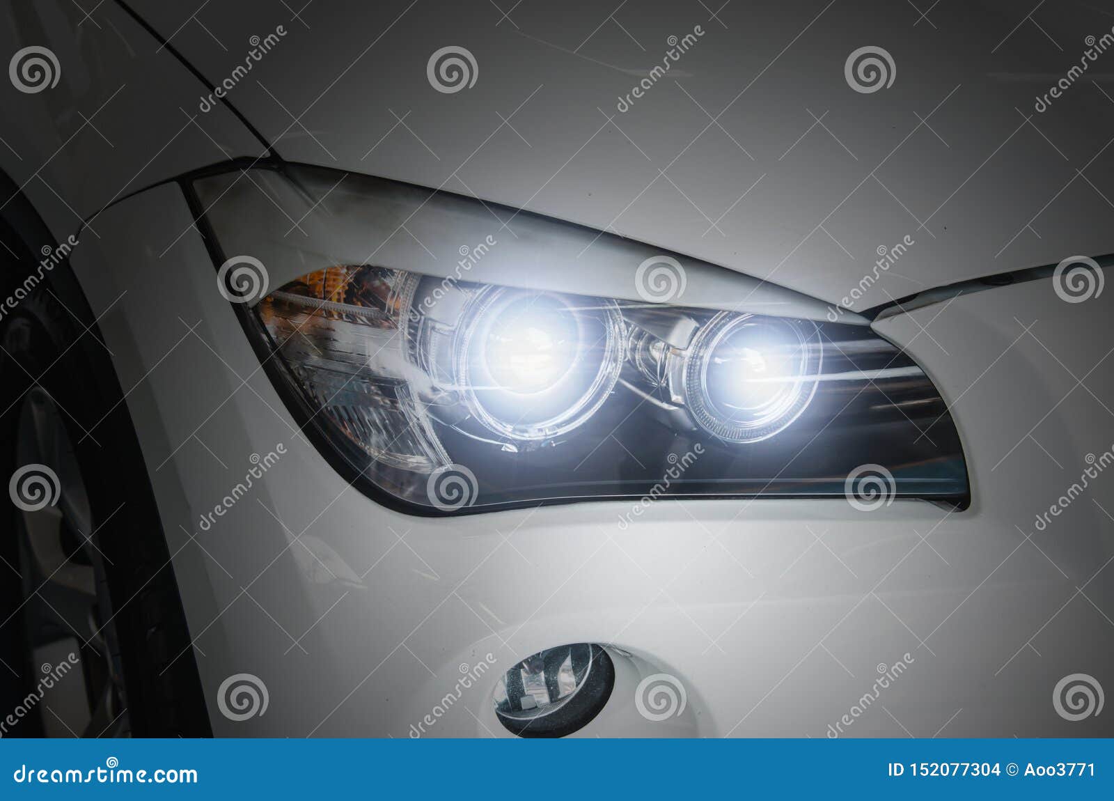 Modern car headlights stock photo. Image of concept - 152077304