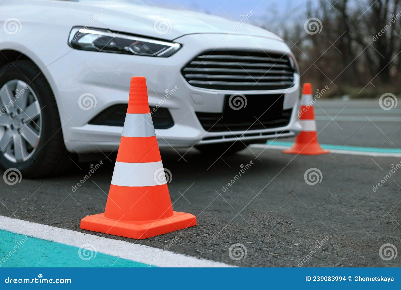 Modern Car at Test Track, Focus on Traffic Cone. Driving School Stock ...