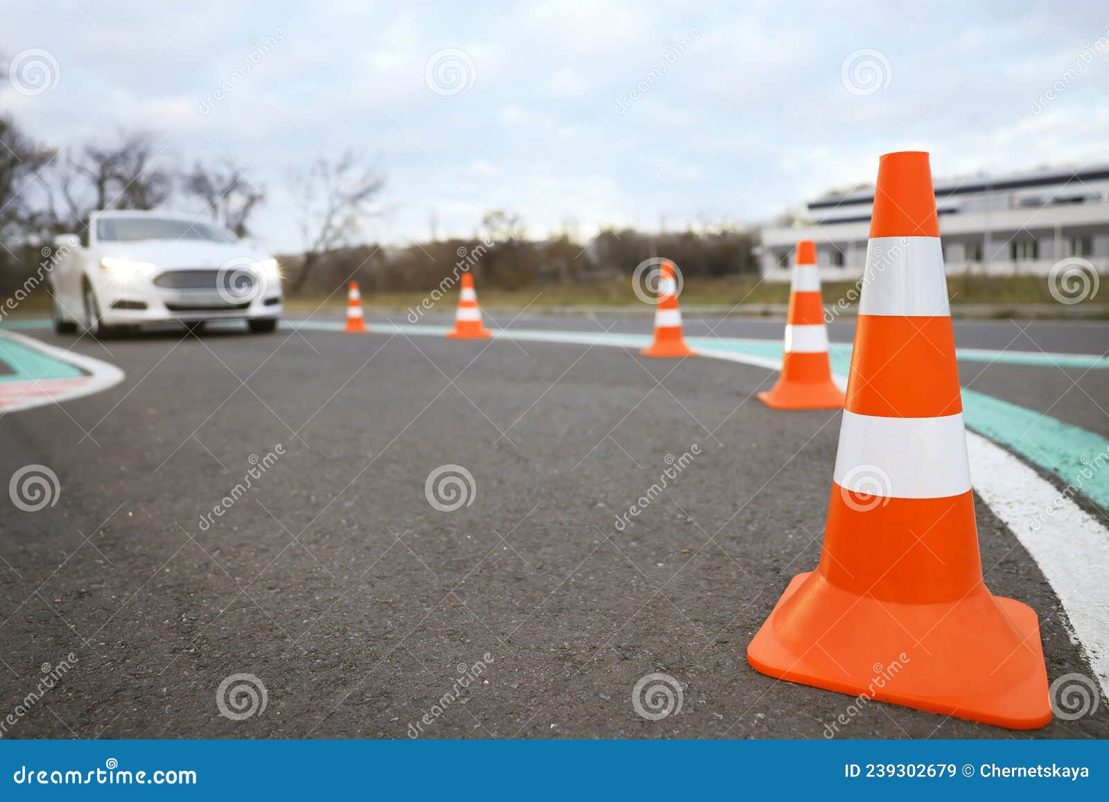 Modern Car at Test Track, Focus on Traffic Cone. Driving School Stock ...