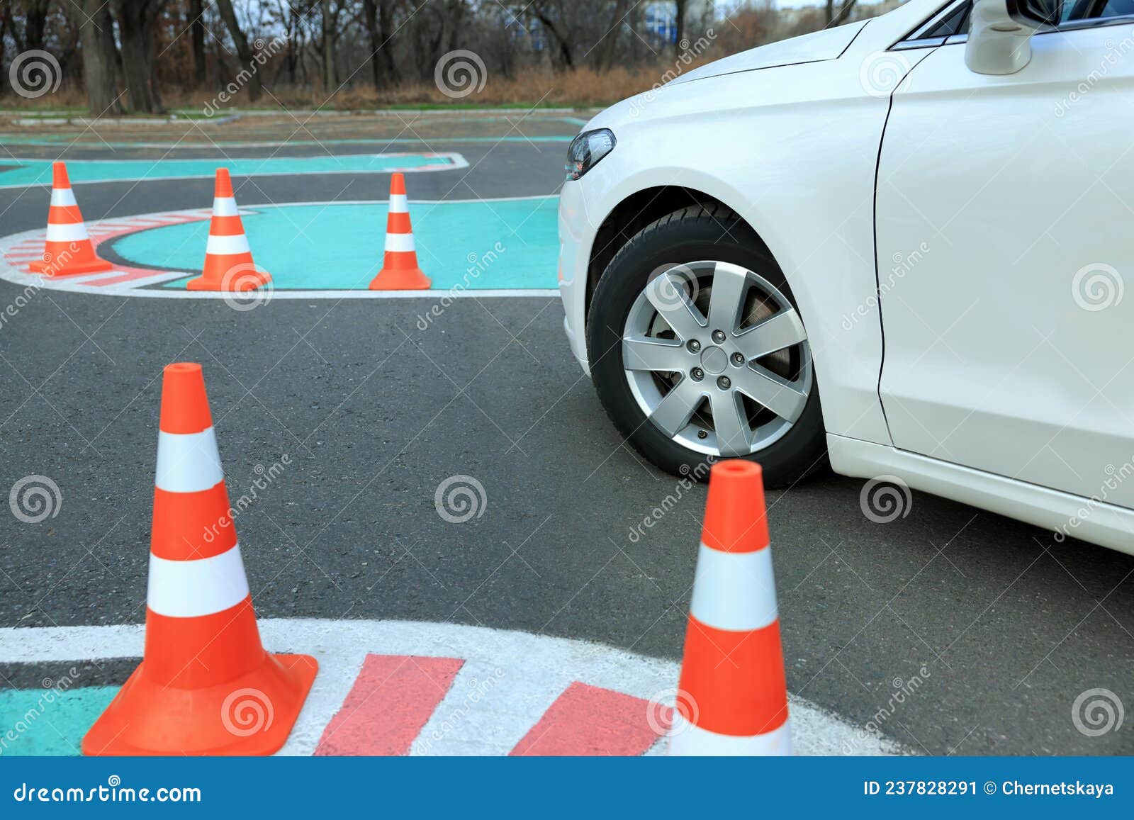 Modern Car on Test Track with Traffic Cones, Closeup. Driving School ...