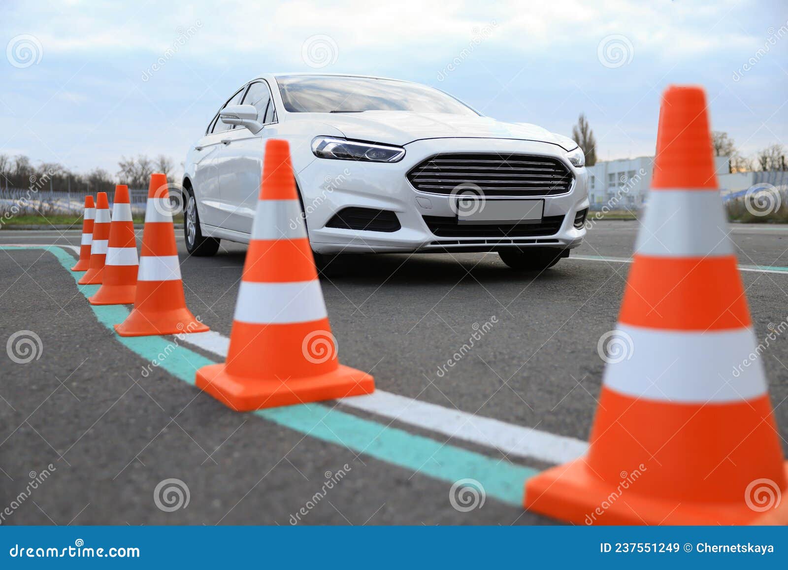 Modern Car on Test Track with Traffic Cones, Low Angle View. Driving ...