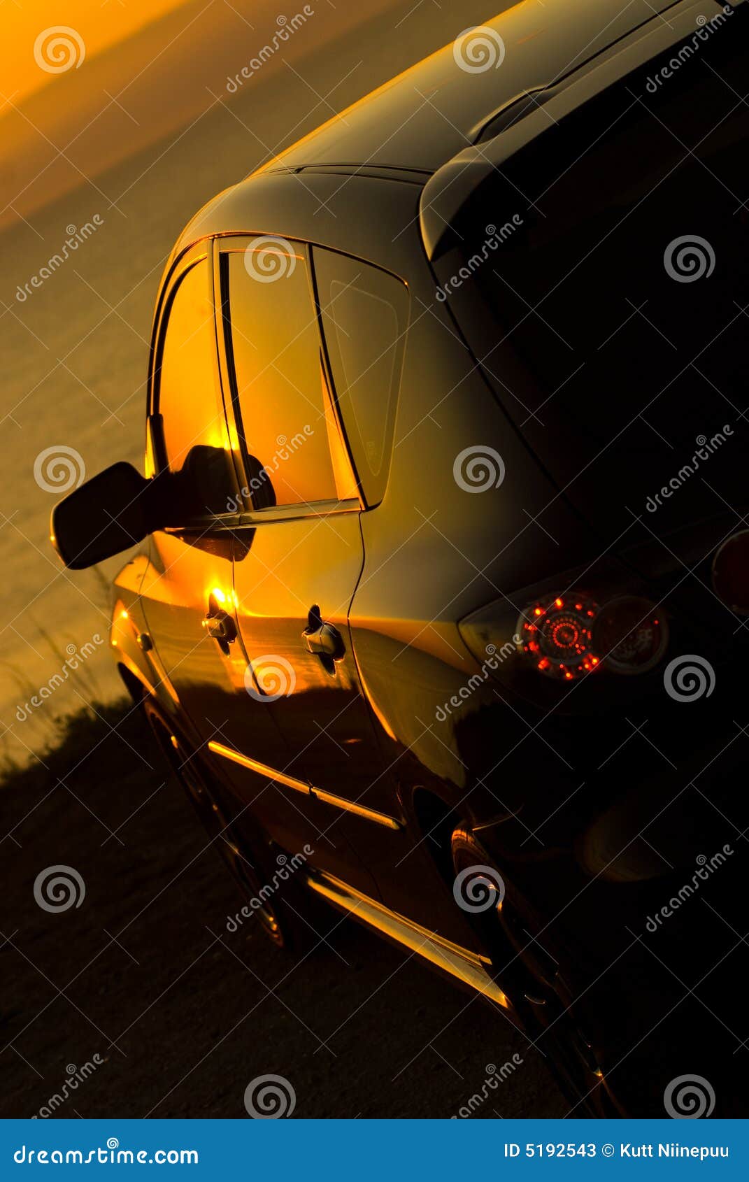 Modern Car Watching Sunset stock image. Image of sunset - 5192543