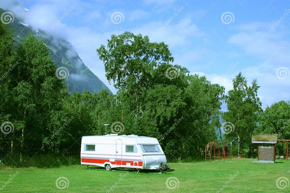 Modern Caravan at the Campsite in the Mountains Stock Image - Image of ...