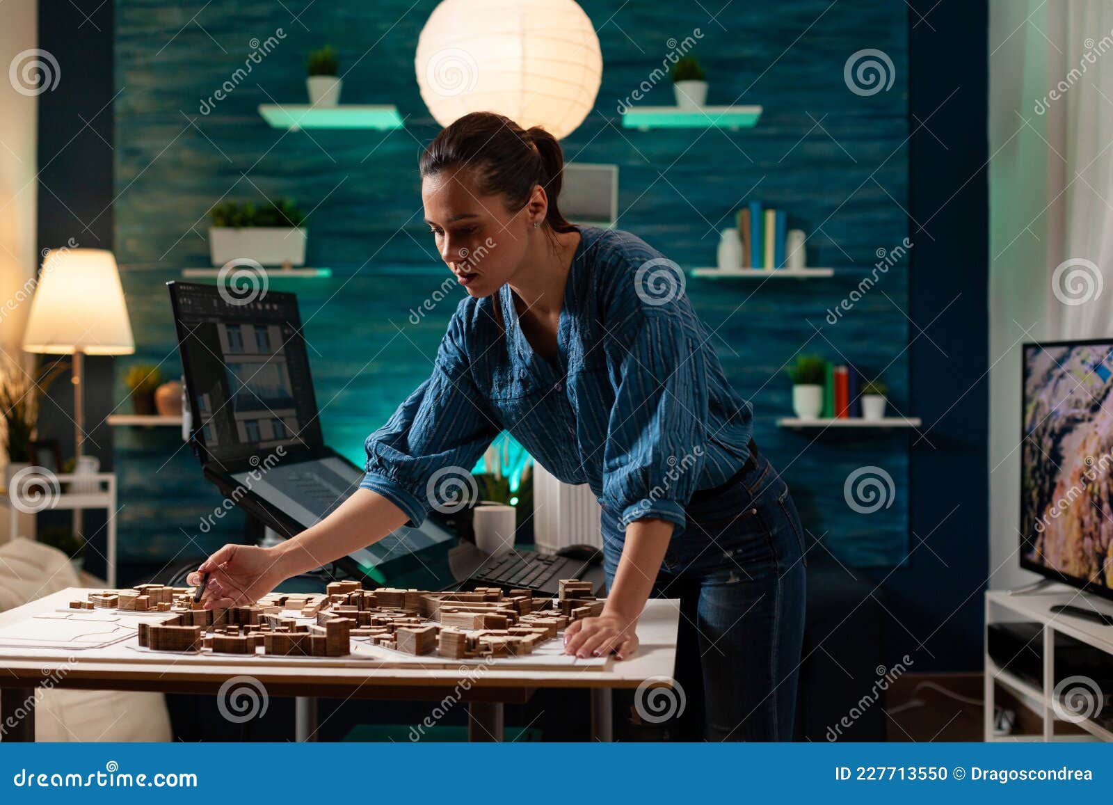 Modern Caucasian Engineer Standing at Table Analyzing Stock Photo ...