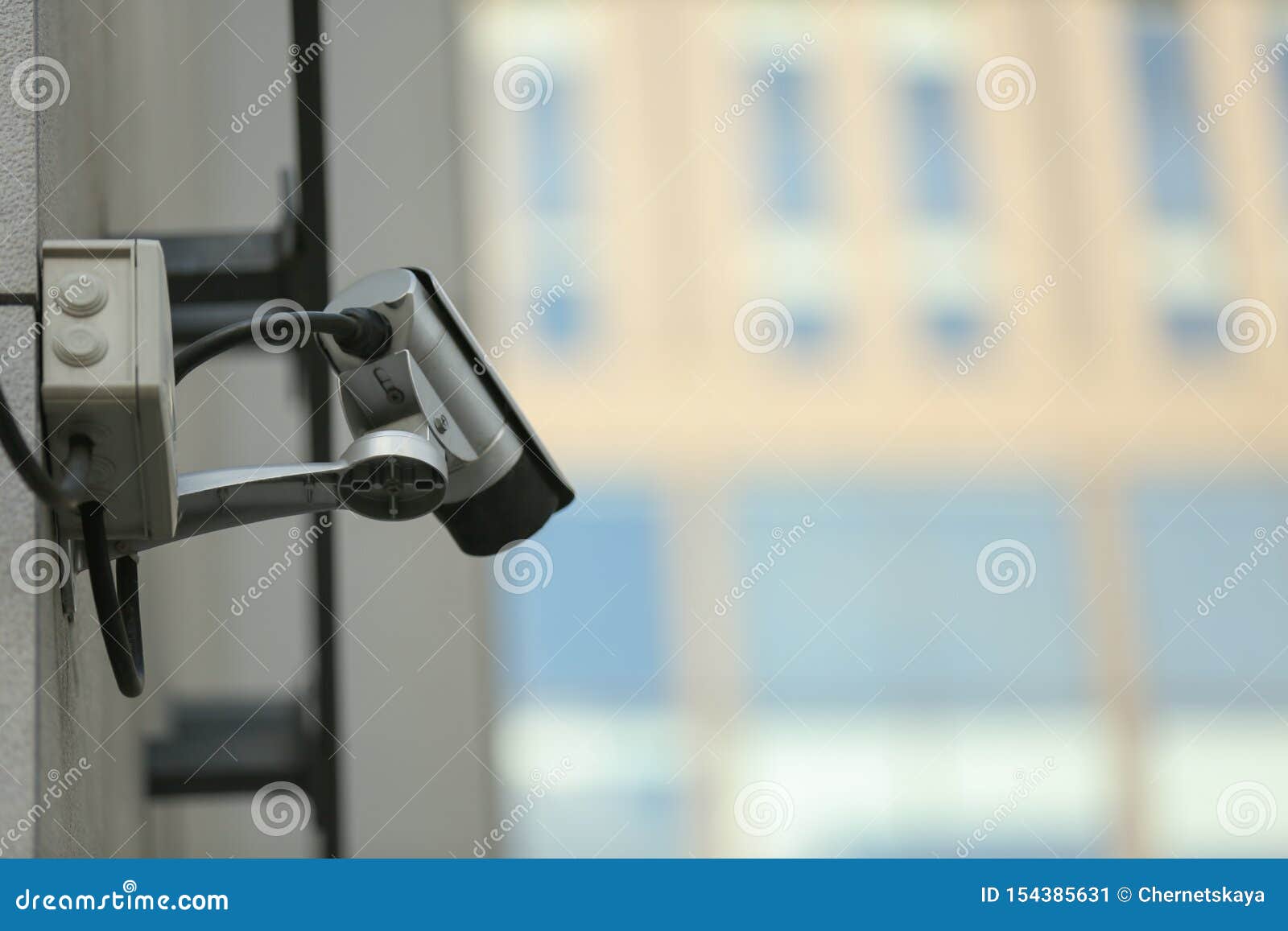 Modern CCTV Security Camera on Building Wall Outdoors. Space for Stock ...