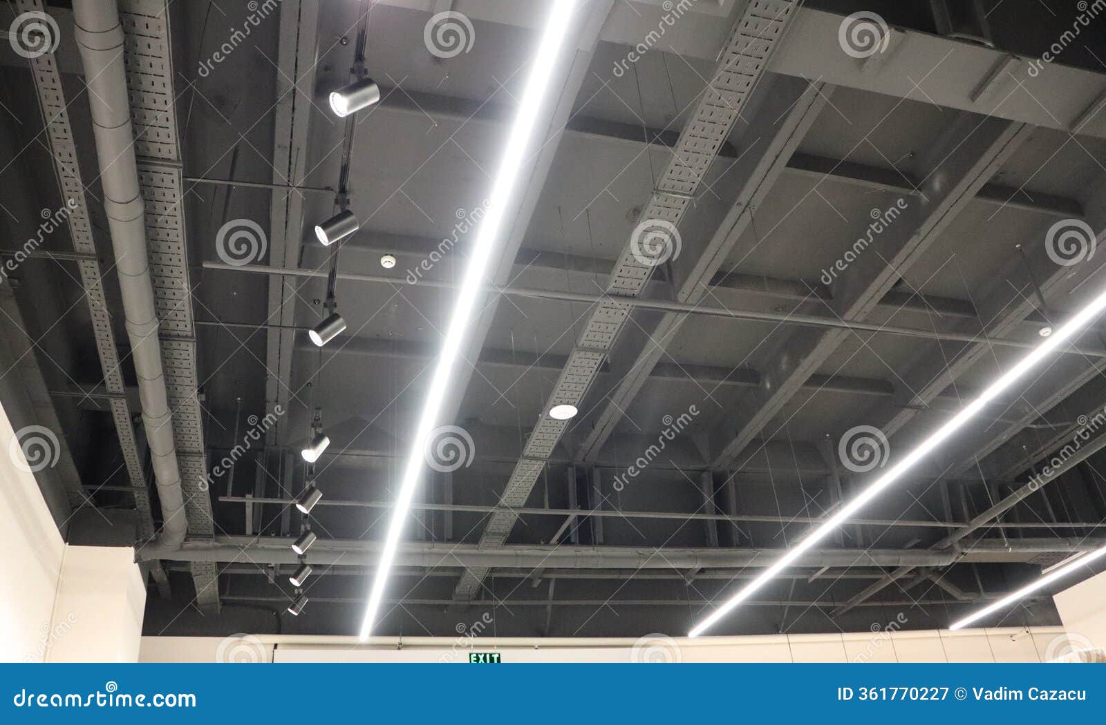 Modern Ceiling Design Features Linear Lighting and Exposed Beams for ...