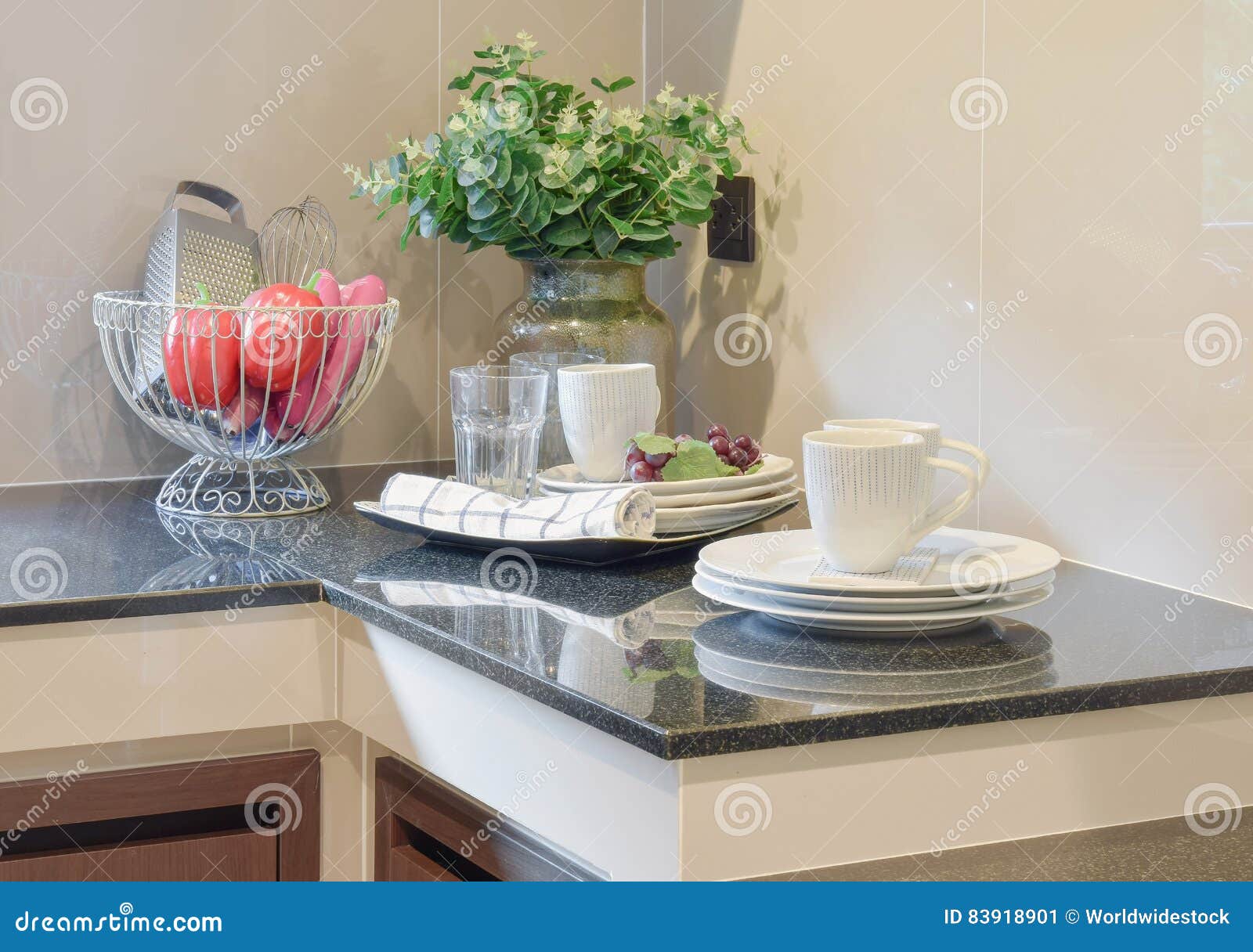 Modern Ceramic Kitchenware and Utensils on the Black Counter Top Stock ...
