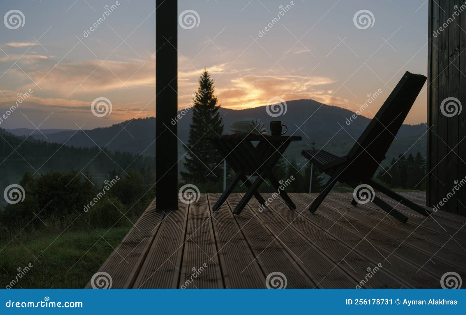 Modern Chair and Table on Terrace with Mountain View at Sunset Stock ...