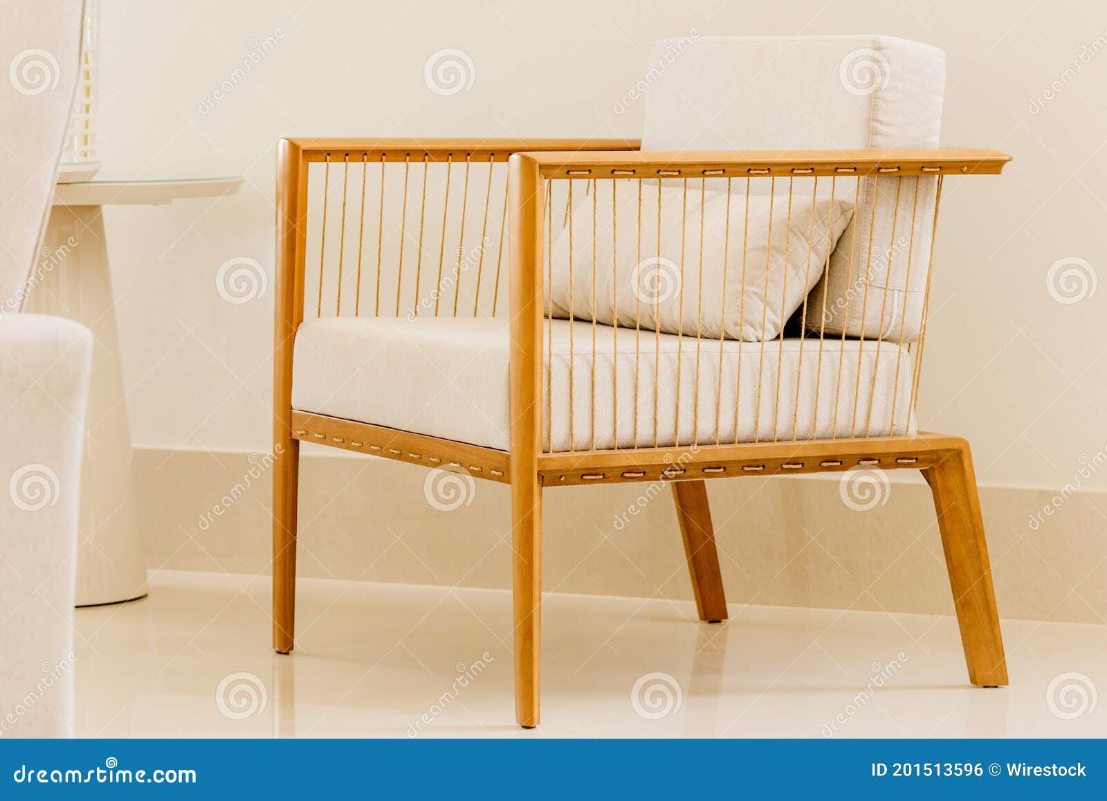 Modern Chair with White Cushions in a White Room Stock Photo - Image of ...