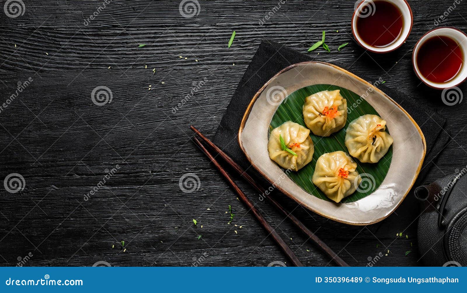 Modern Chinese Food Dumpling and Tea Set on Black Rustic Table Top ...