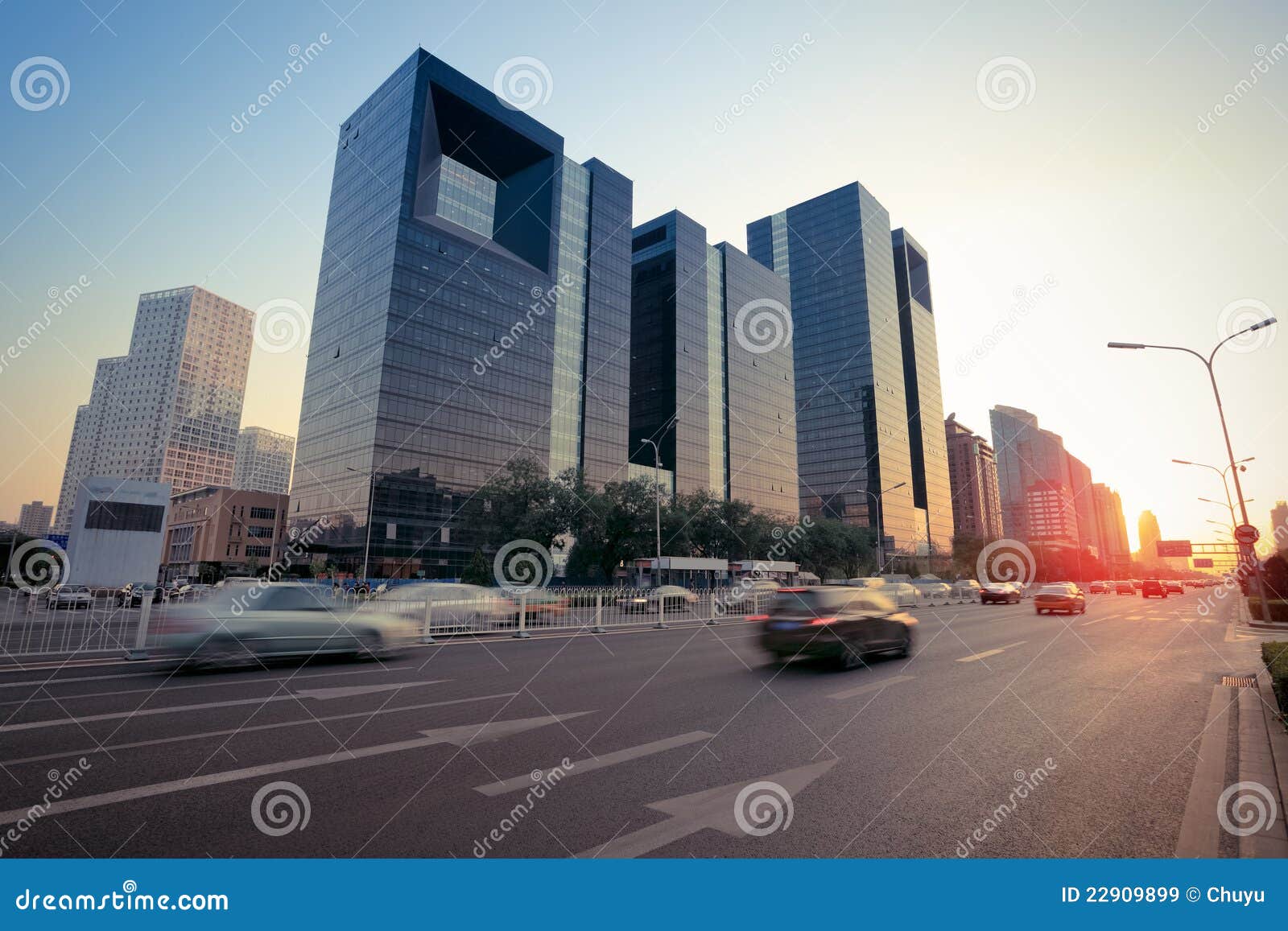 Modern city street at dusk stock image. Image of city - 22909899