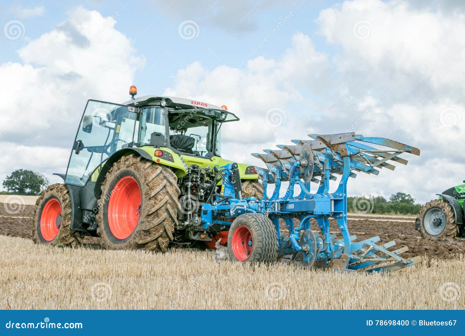 Modern Claas Tractor Pulling a Plough Editorial Image - Image of autumn ...