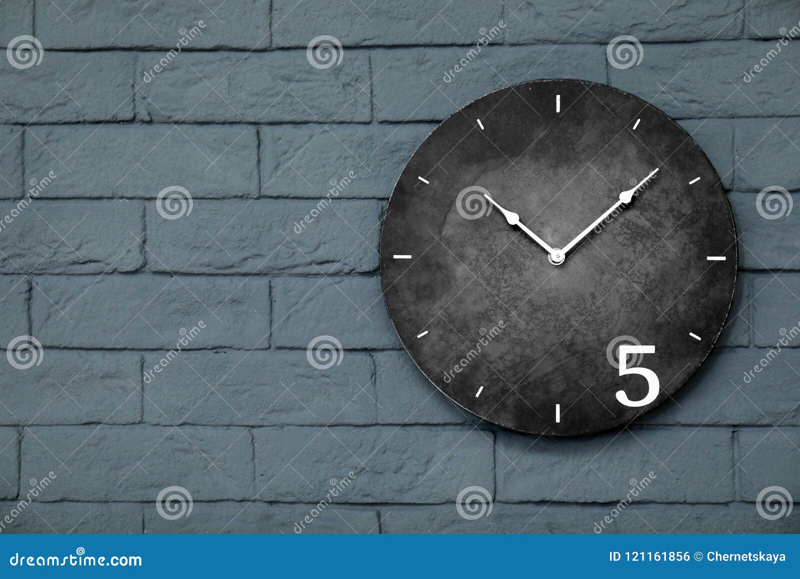 Modern clock on brick wall stock photo. Image of deadline - 121161856