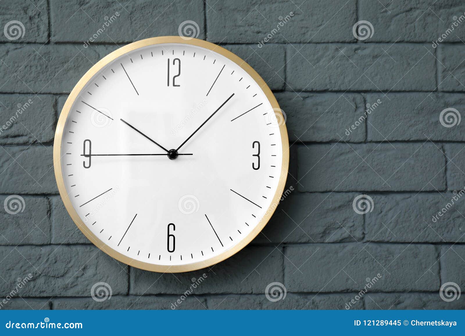 Modern clock on brick wall stock image. Image of business - 121289445