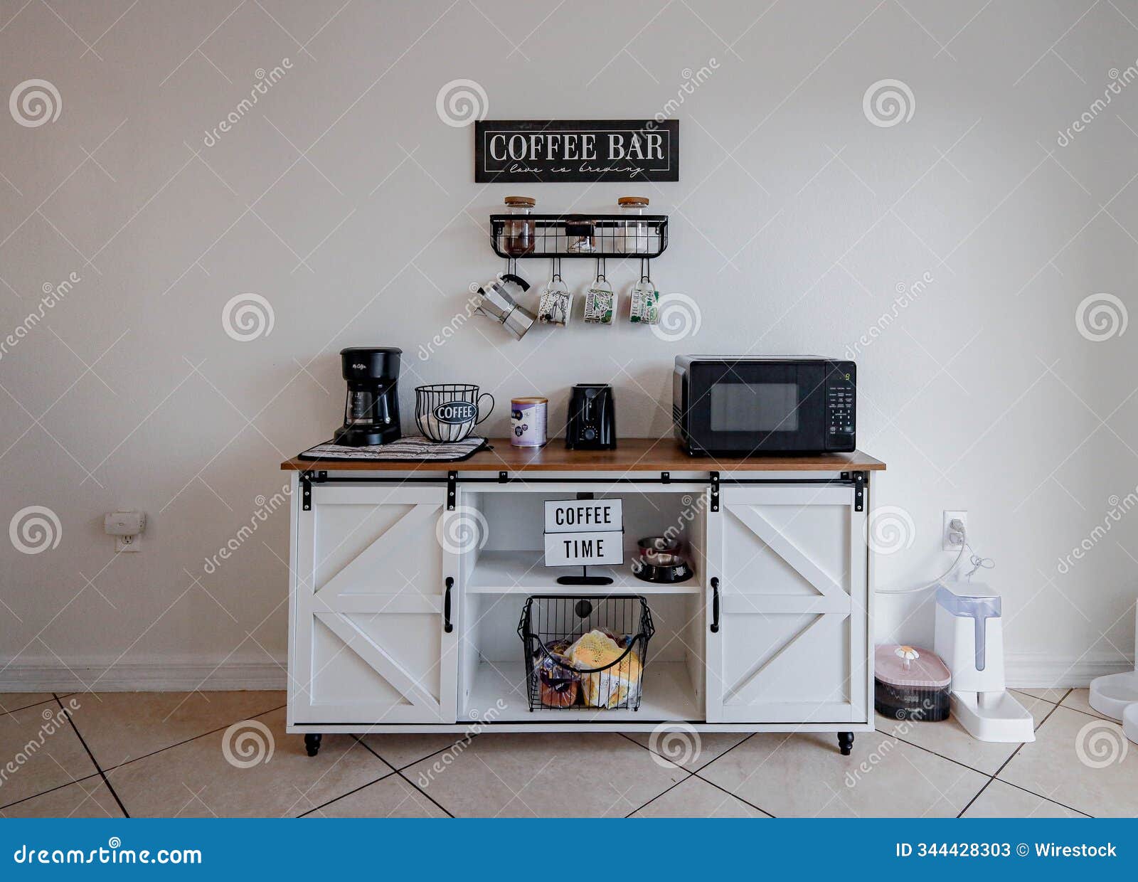 Modern Coffee Bar Setup Featuring a Coffee Maker, Microwave, and ...