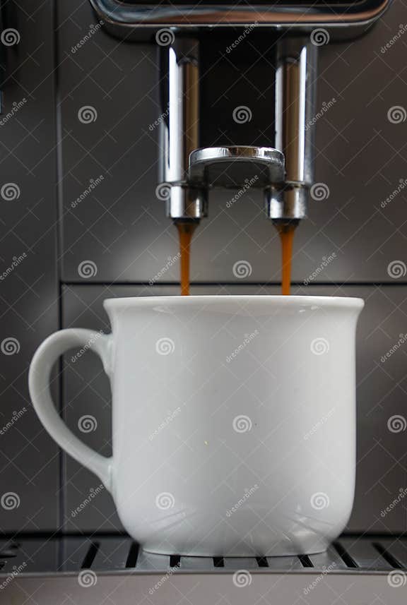 Modern Coffee Machine Cup and Flowing Coffee Stock Photo - Image of ...