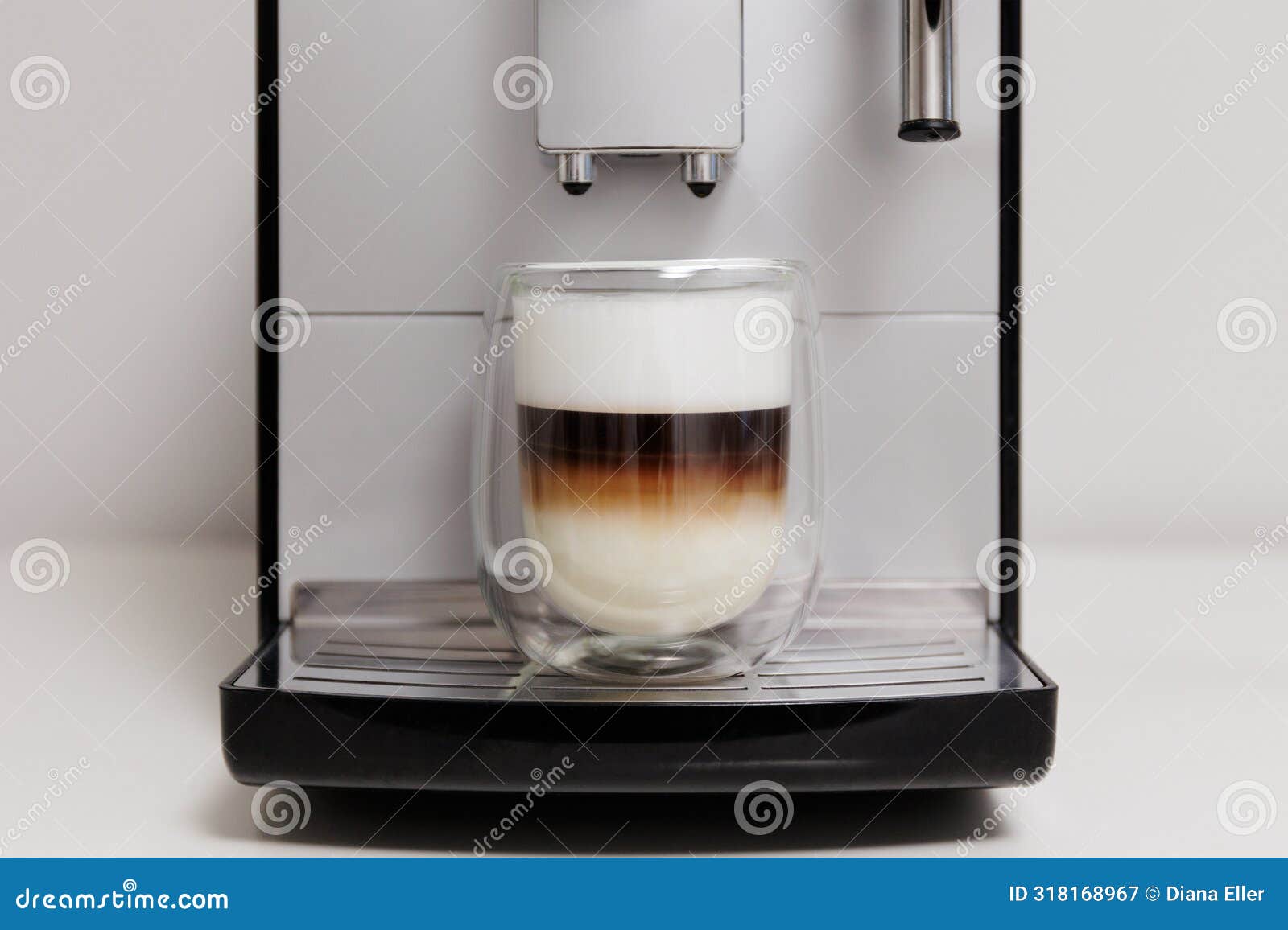 Modern Coffee Machine with Glass Cup of Latte on the Table Stock Image ...