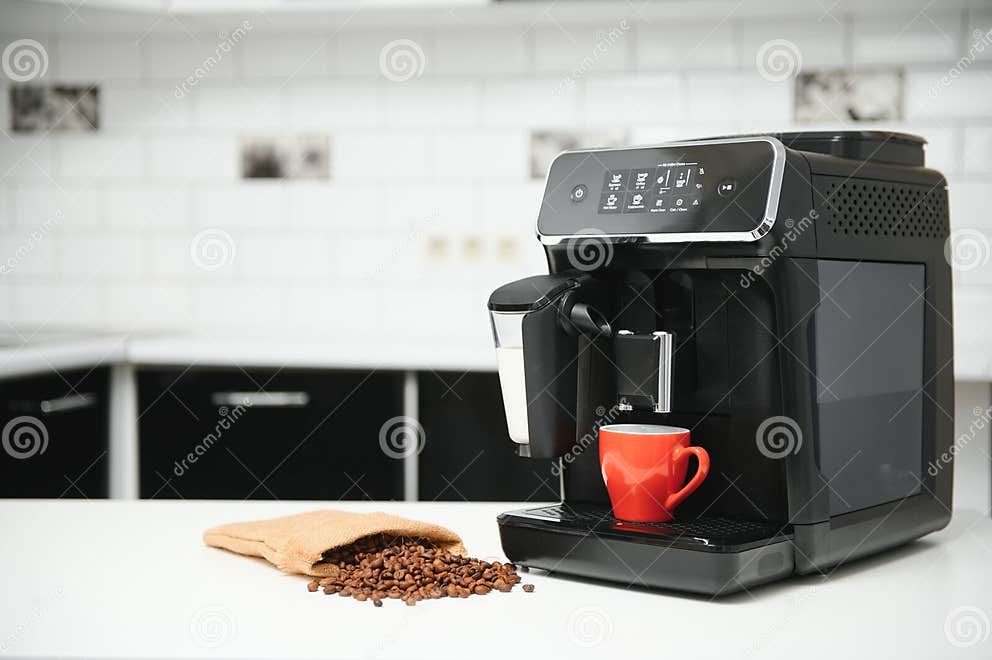 Modern Coffee Machine on Table in Kitchen Stock Photo - Image of ...