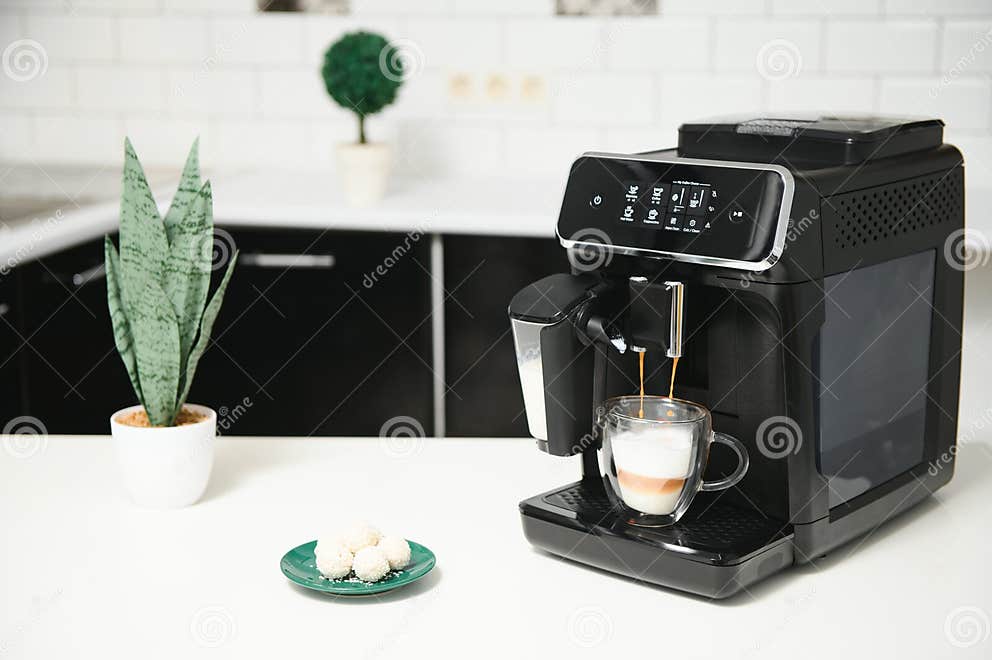 Modern Coffee Machine on Table in Kitchen Stock Image - Image of coffee ...