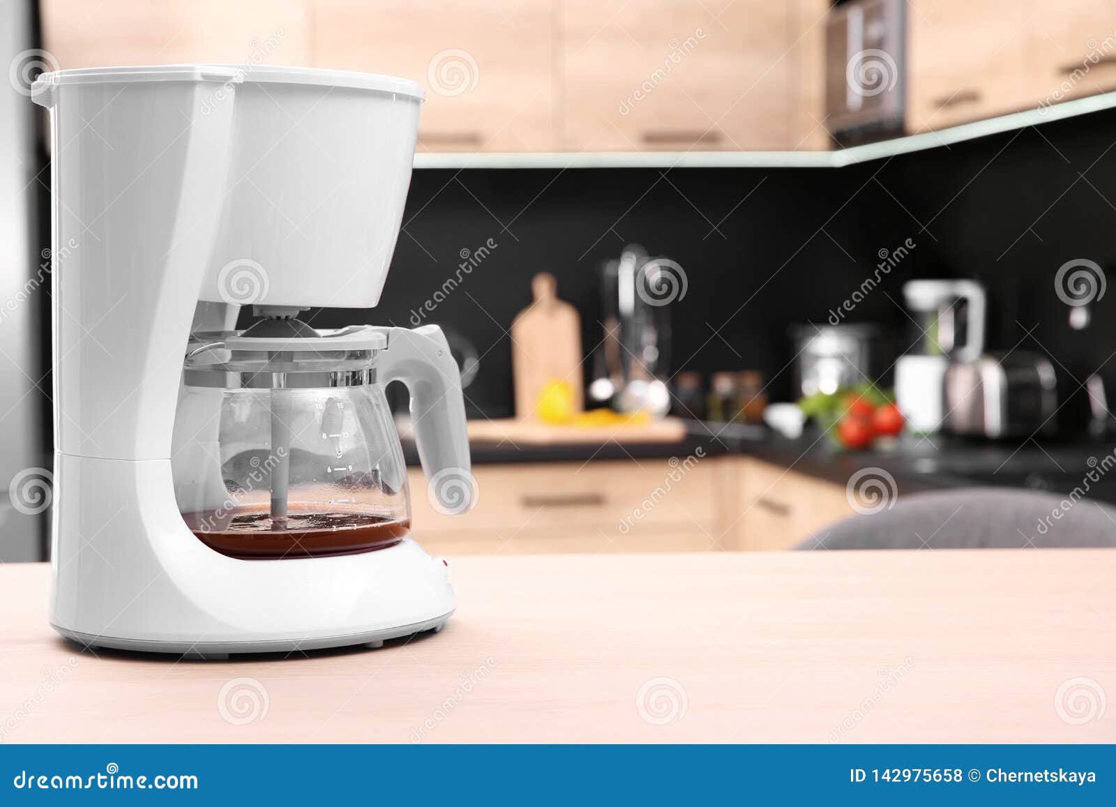 Modern Coffee Maker on Wooden Table in Kitchen Stock Photo - Image of ...