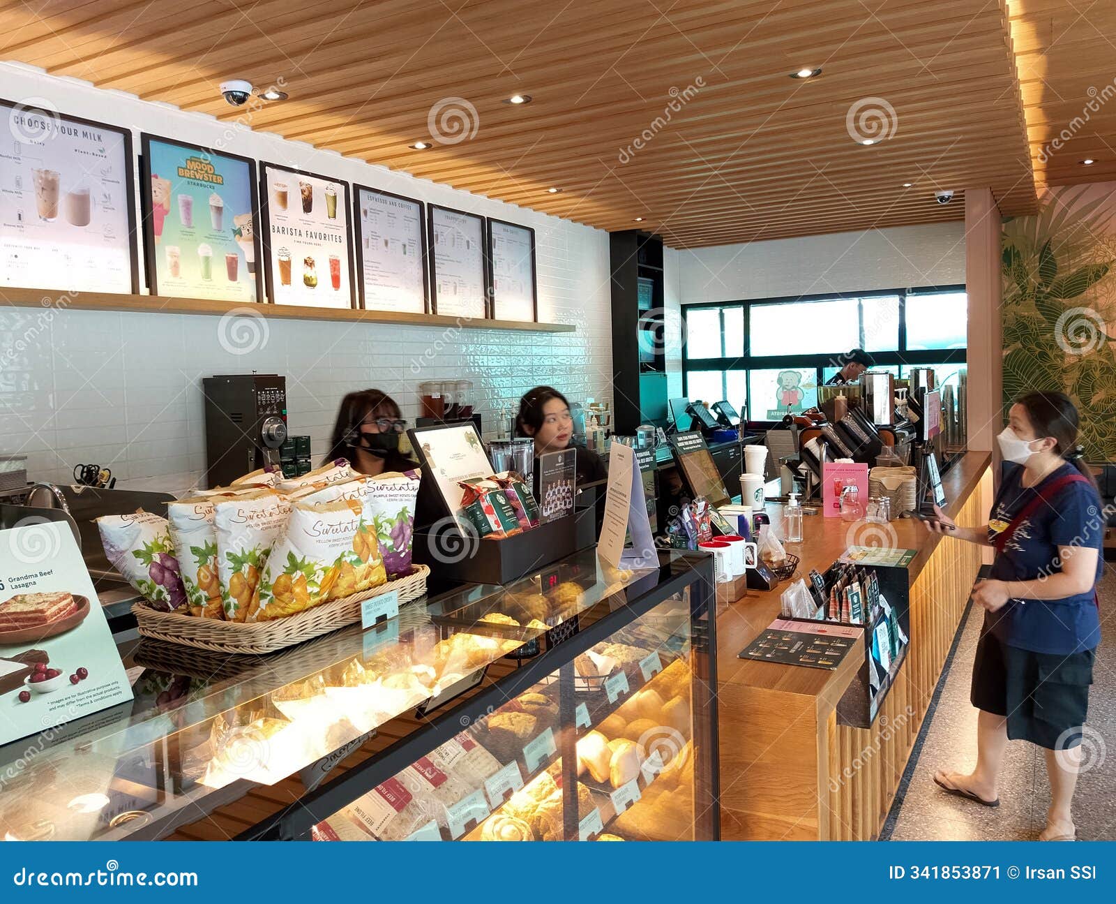 Modern Coffee Shop Counter Interaction with Customer Ordering Amid Cozy ...