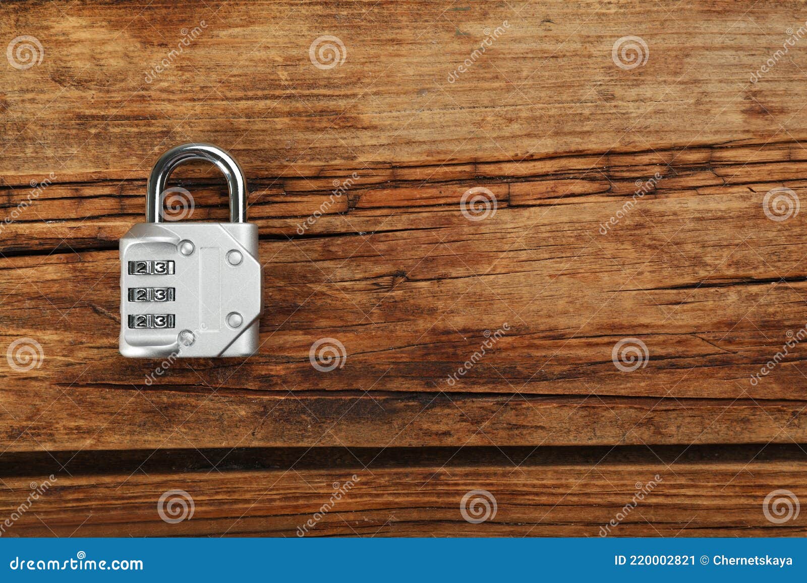 Modern Combination Lock on Wooden Table, Top View. Space for Text Stock ...