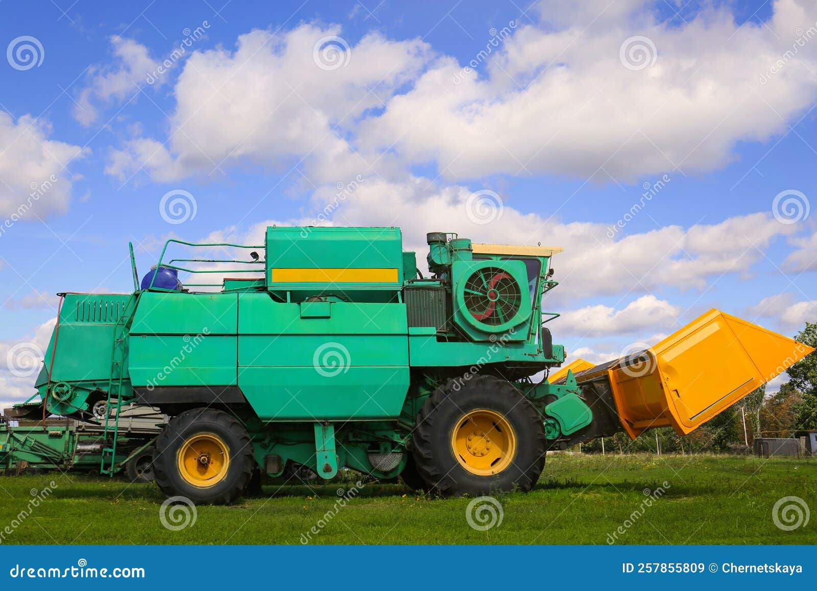 Modern Combine Harvester on Green Lawn with Fresh Grass Editorial Stock ...
