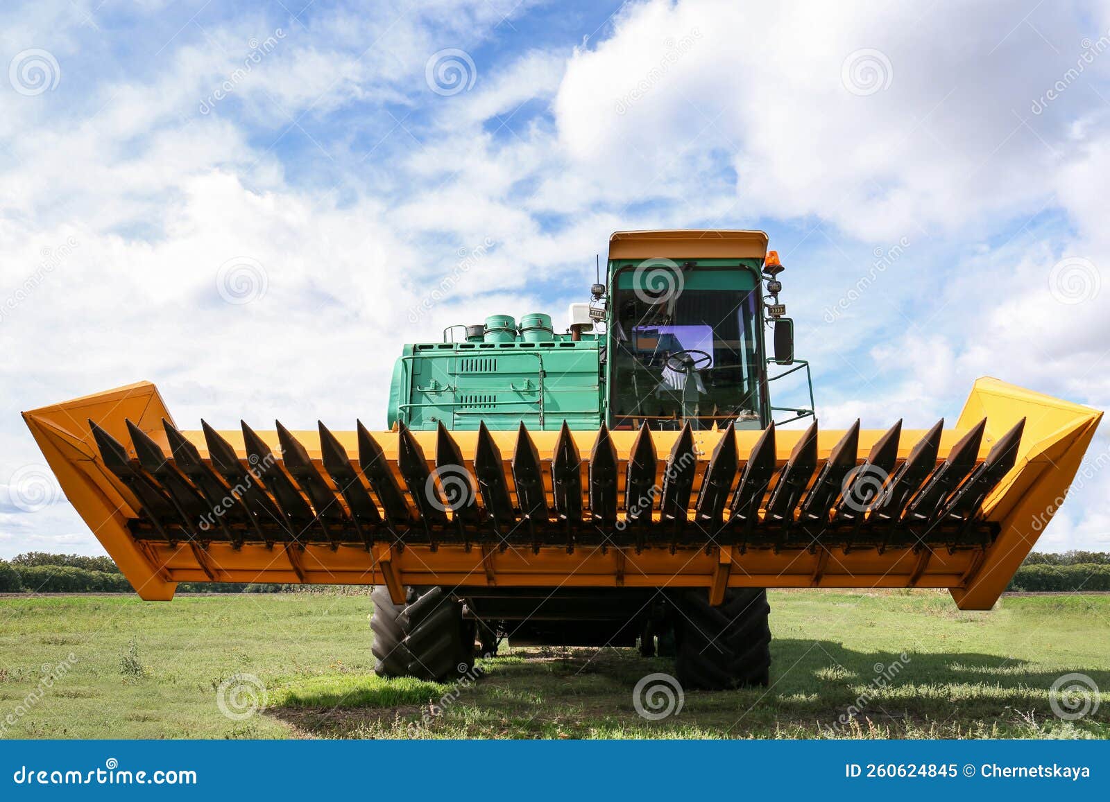 Modern Combine Harvester on Green Lawn with Fresh Grass Stock Image ...