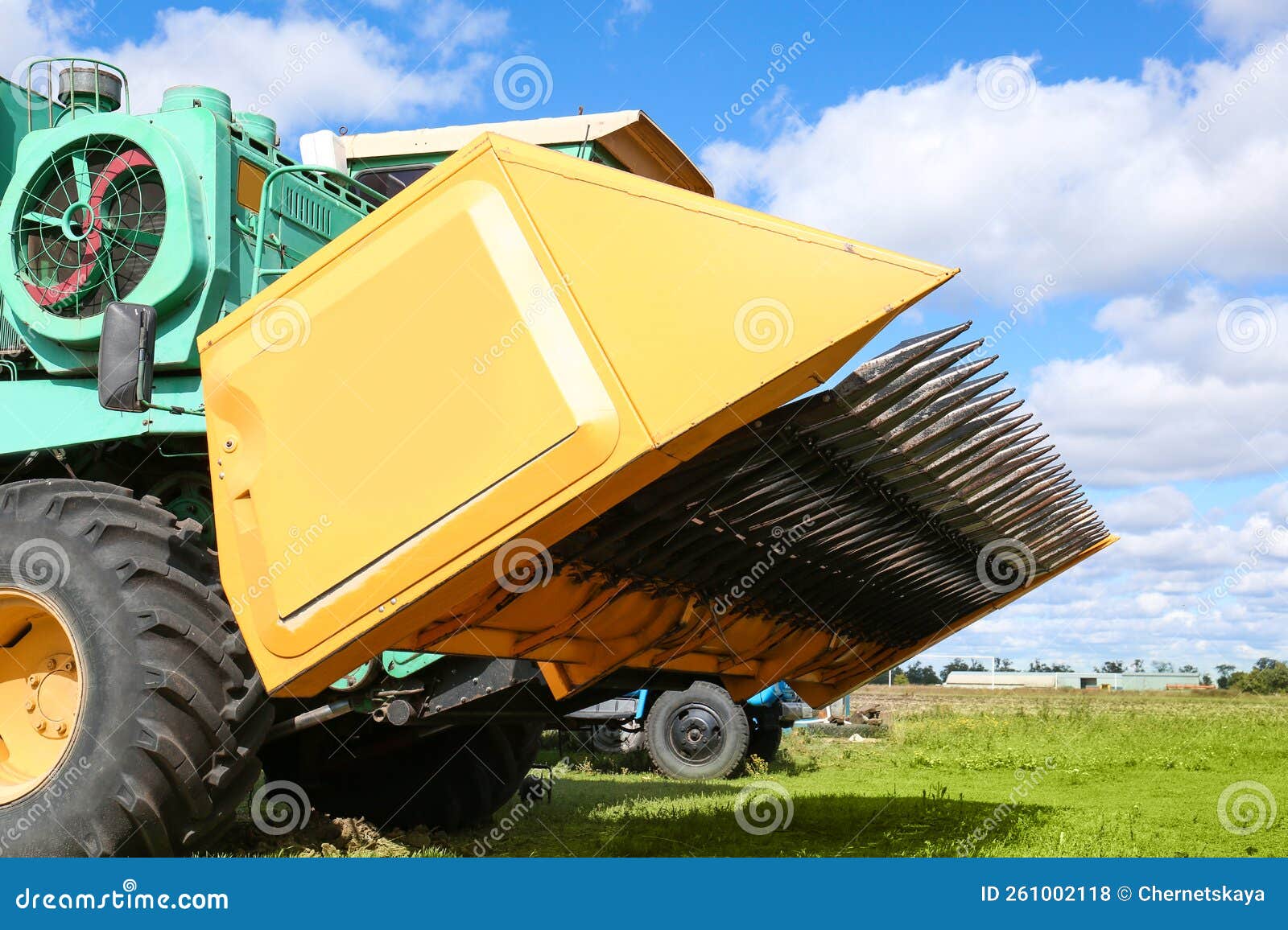 Modern Combine Harvester on Green Lawn with Fresh Grass Editorial Stock ...