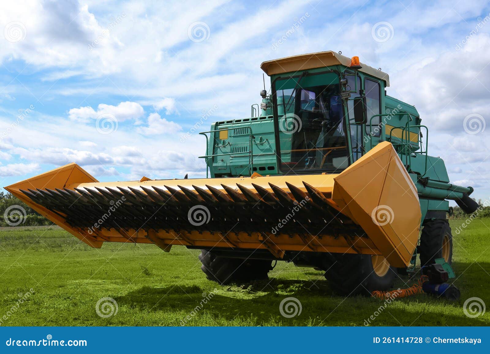 Modern Combine Harvester on Green Lawn with Fresh Grass Editorial Stock ...