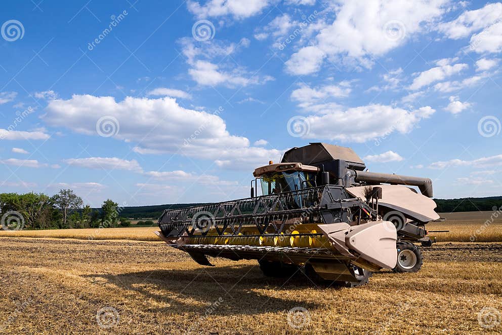 A Modern Combine Harvester Stands on the Field during Harvesting Withe ...