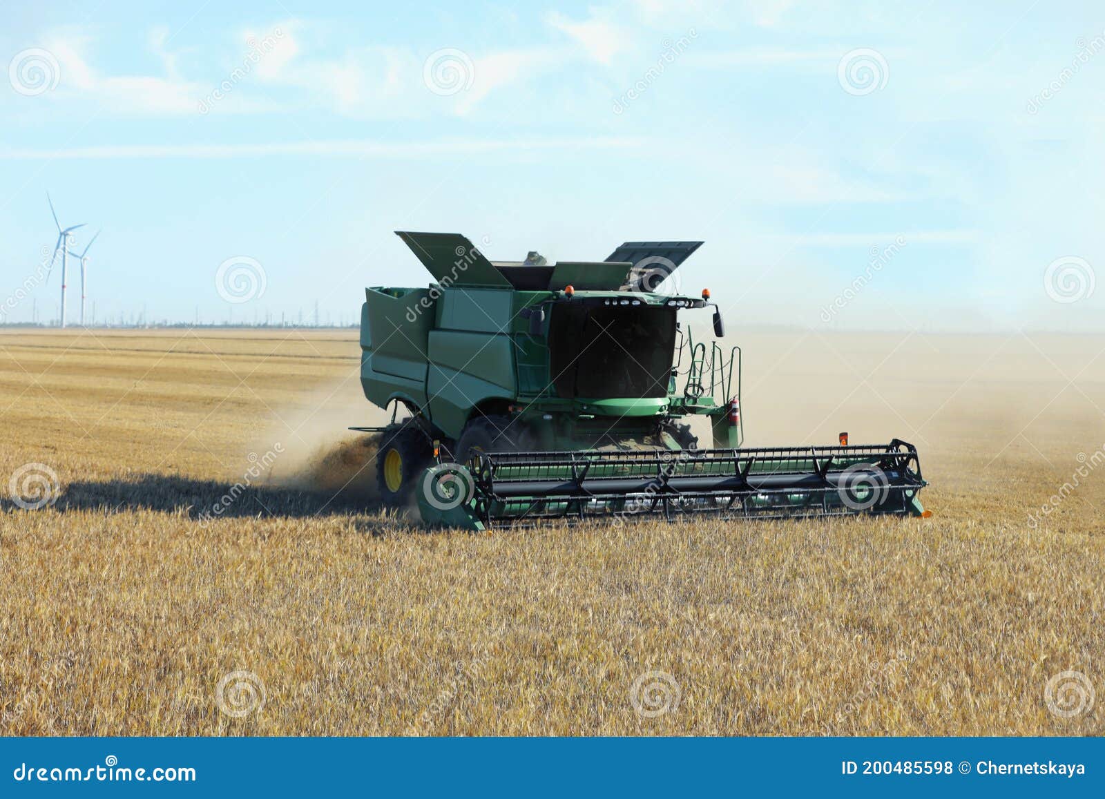 Modern Combine Harvester Working in Agricultural Field Stock Photo ...