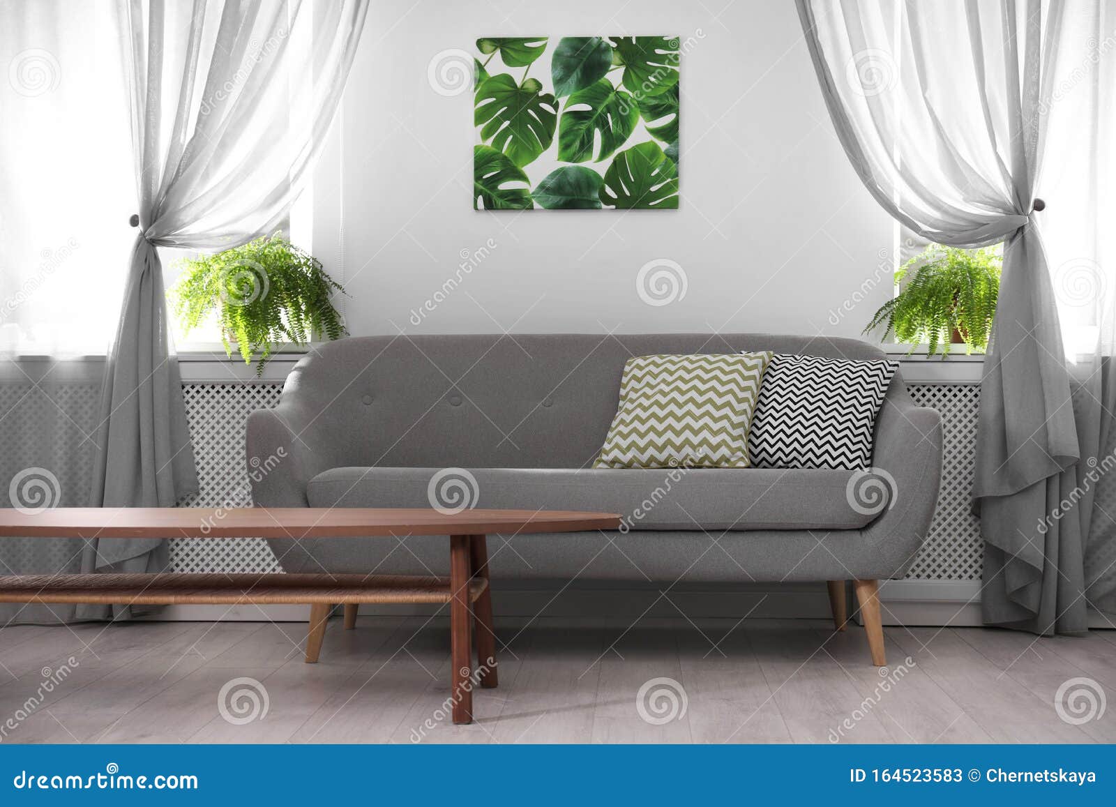 Modern Comfortable Sofa in Stylish Home Stock Image - Image of ...
