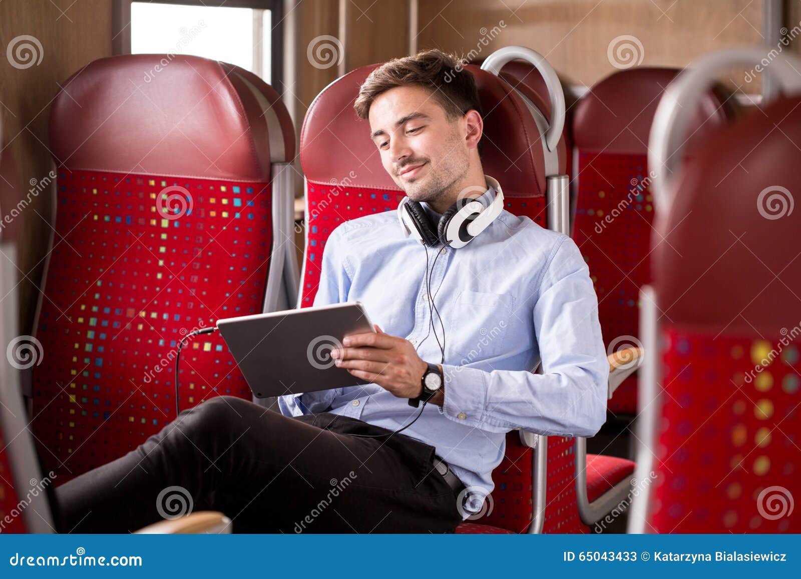 Modern Commuter Relaxing on Train Stock Image - Image of train, young ...
